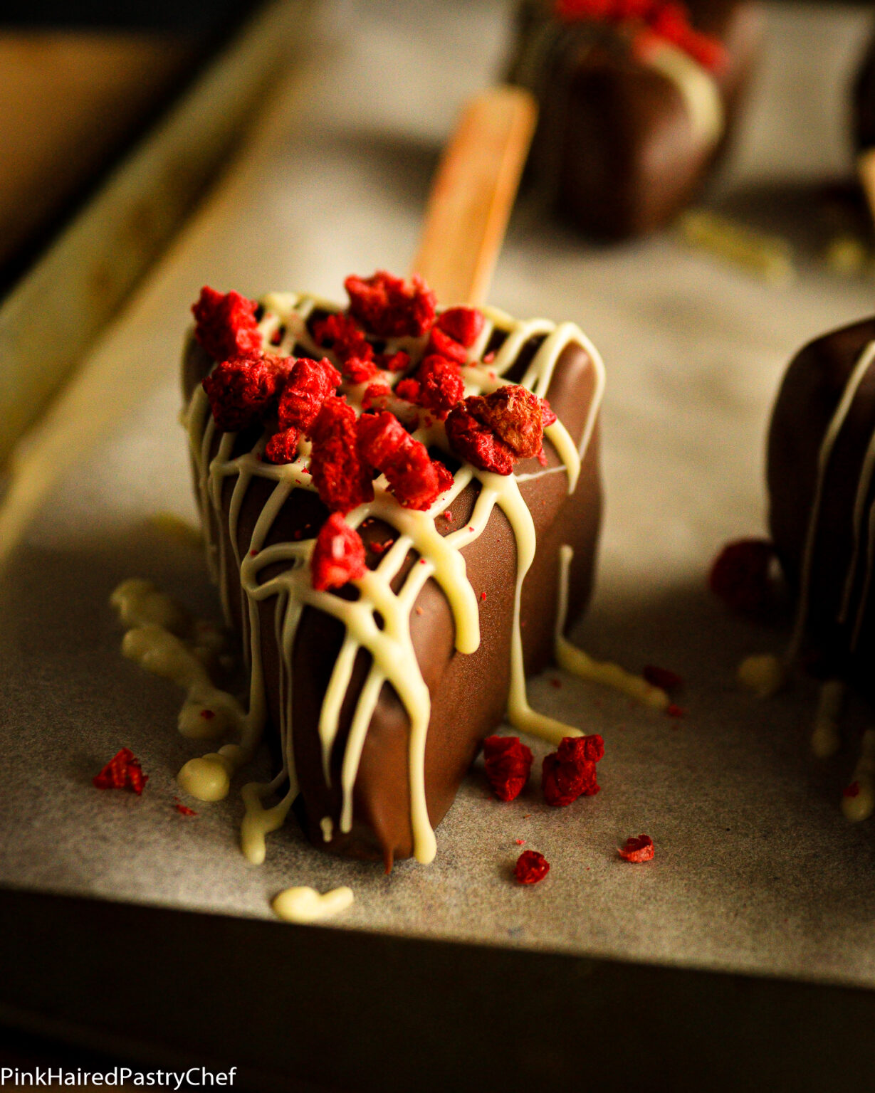 Chocolate Covered Raspberry Cheesecake Pops Recipe - Pink Haired Pastry ...